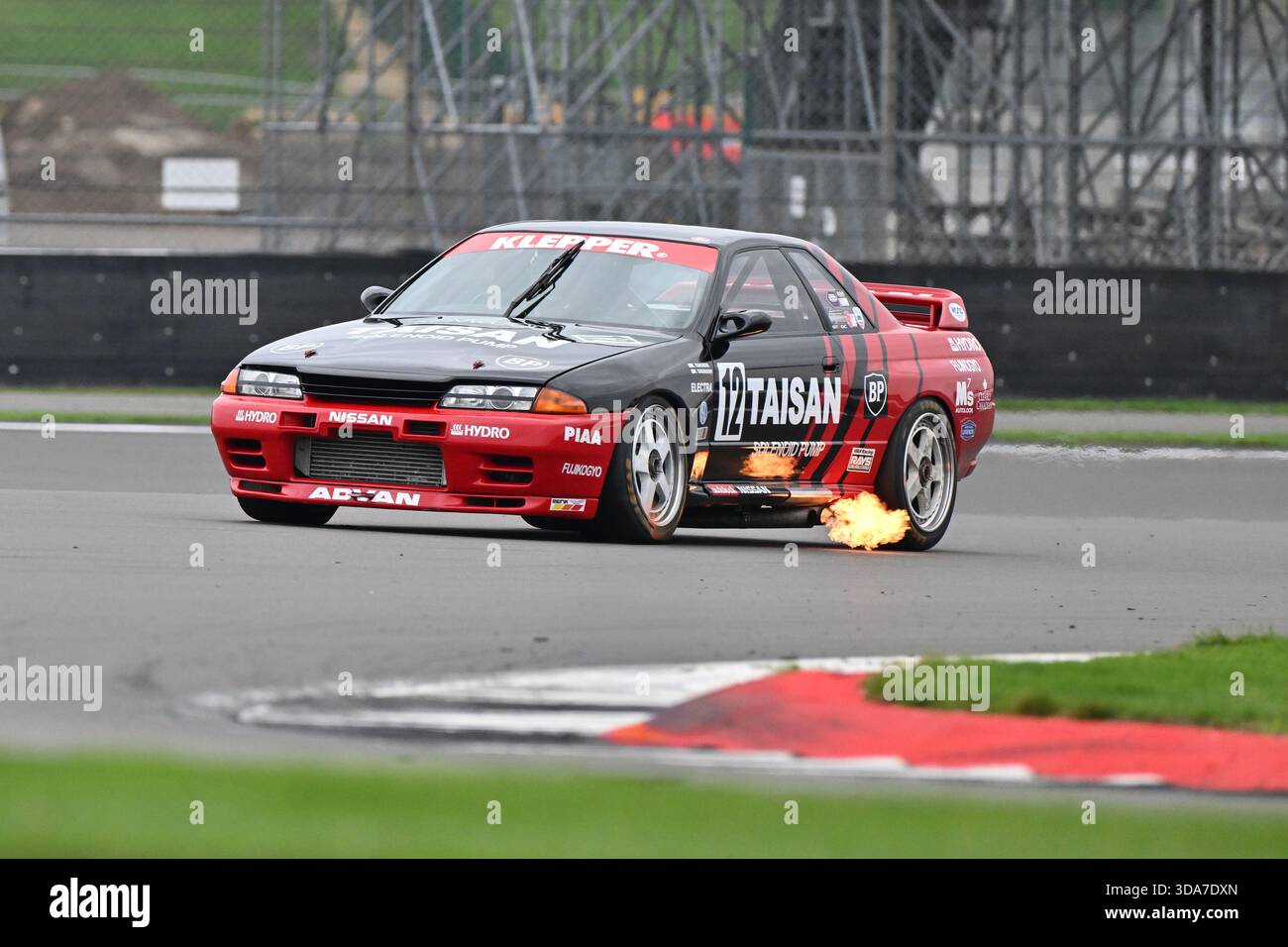 A burst of exhaust flame, Nic Strong, Nissan GTR, Historic Car ...