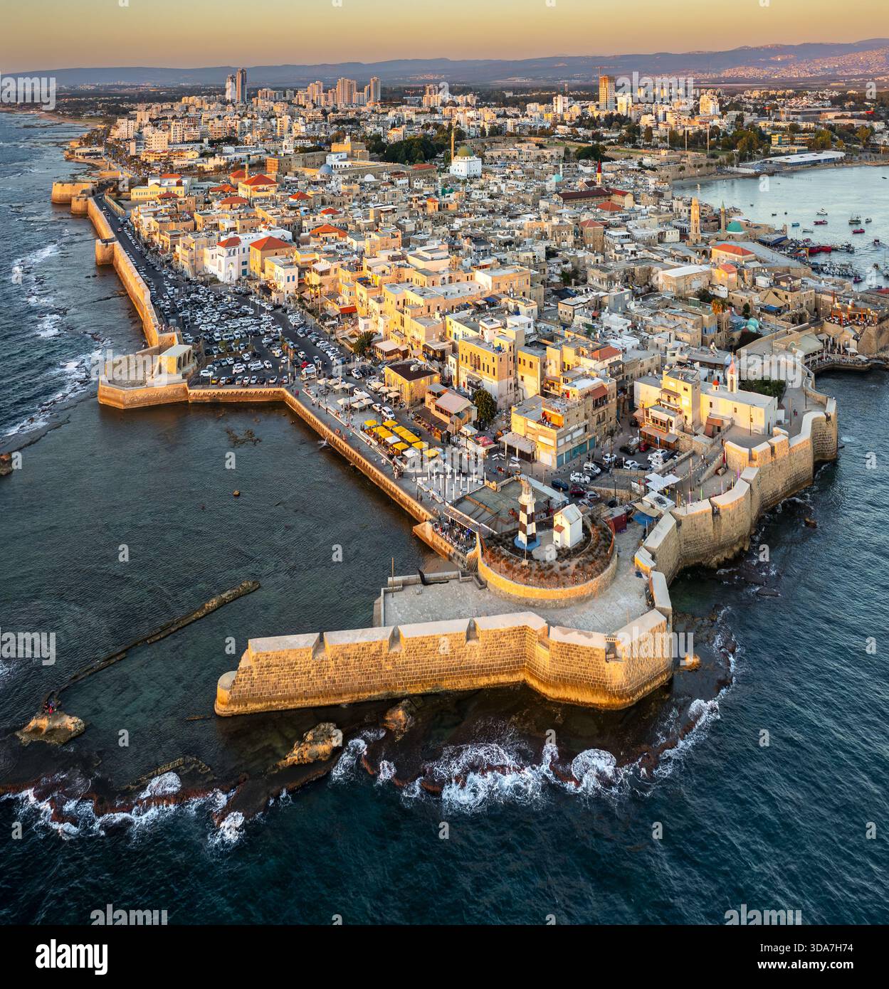 Aerial view of ancient walls meet the turquoise sea, old city ...