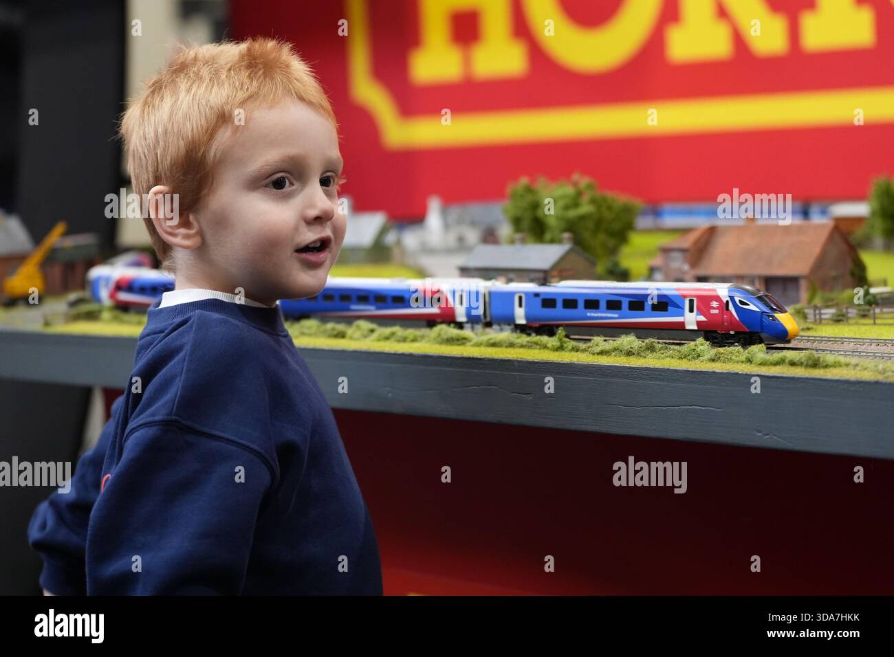 Lowe Smith, 3, from East Dulwich, views a model train decorated with ...