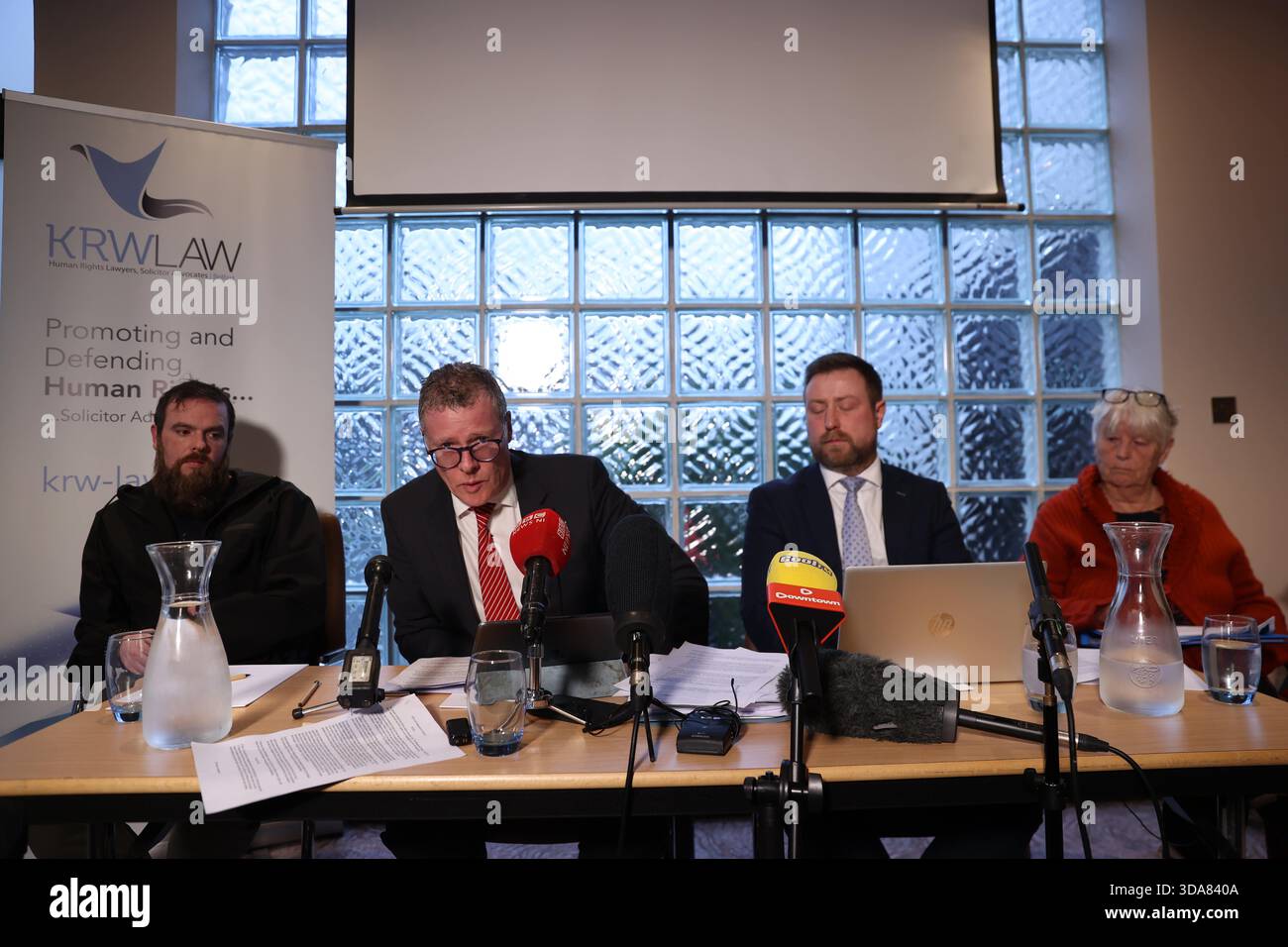 Kevin Winters of KRW Law (second left) speaking to the media at the ...