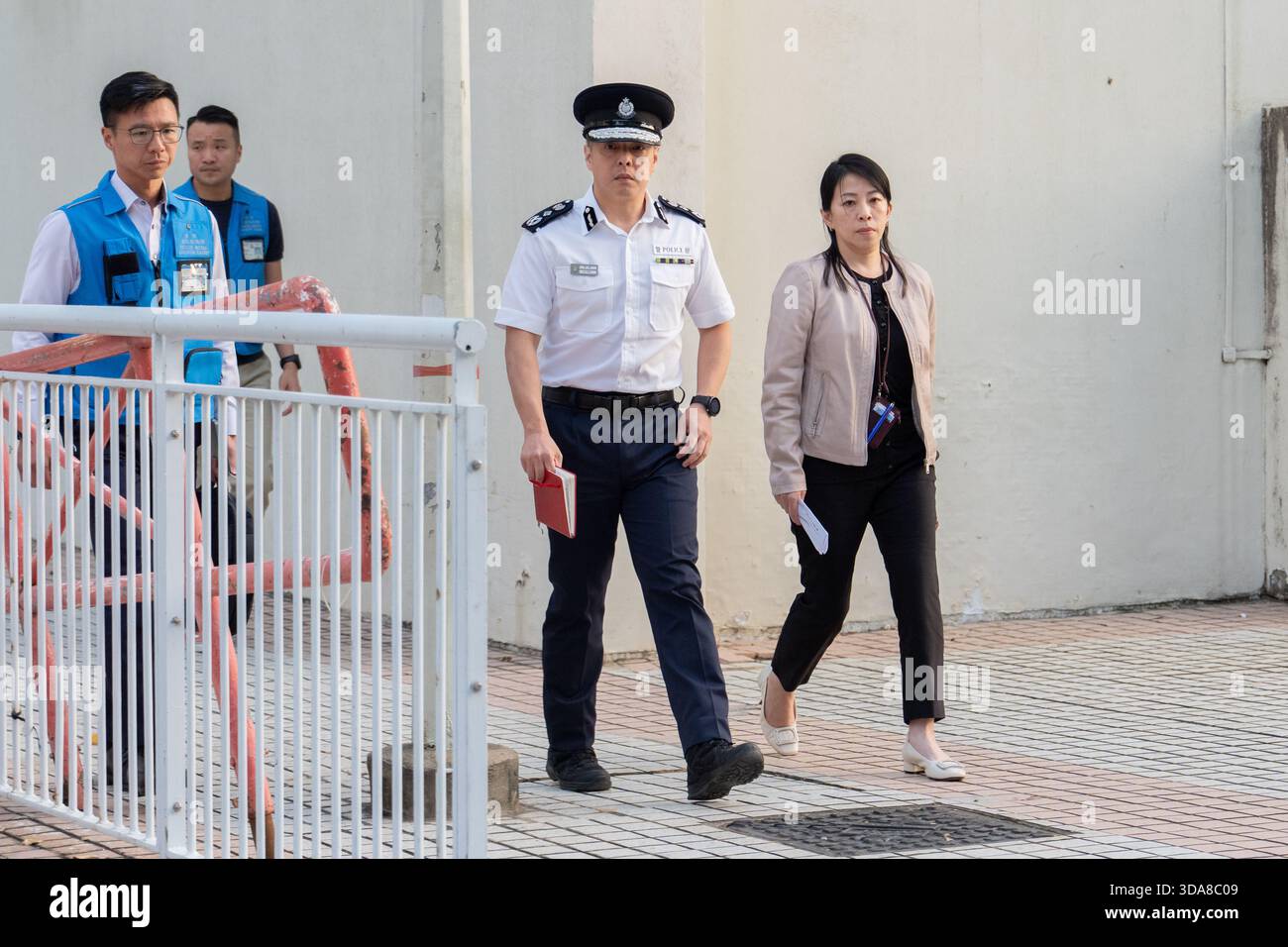 Joe Chow Yat-ming (second right), Commissioner of Police and Tsang Shuk ...