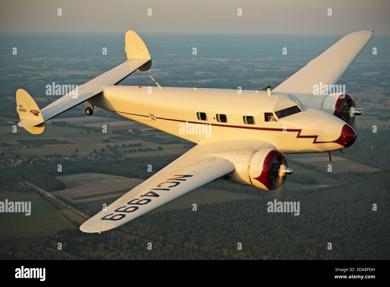 Air-to-air photograph of a Lockheed 12 Electra Junior, registration ...