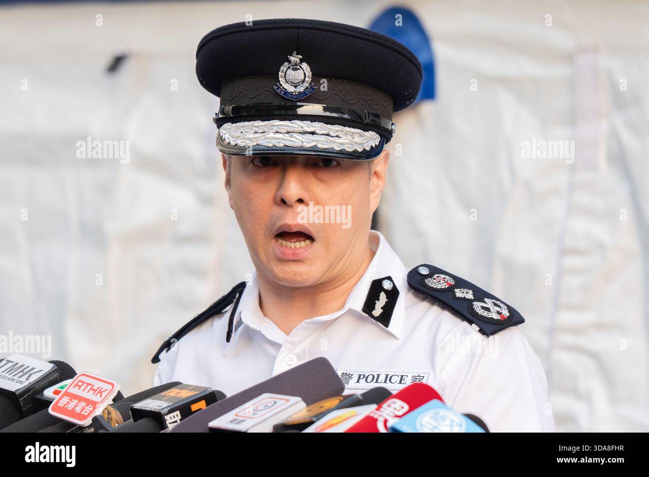 Joe Chow Yat-ming, Commissioner of Police, speaking to the press on December 9, 2025 in Hong ...