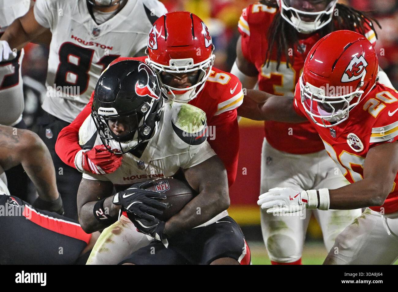 Kansas City Chiefs safety Bryan Cook (6) tackles Houston Texans running ...