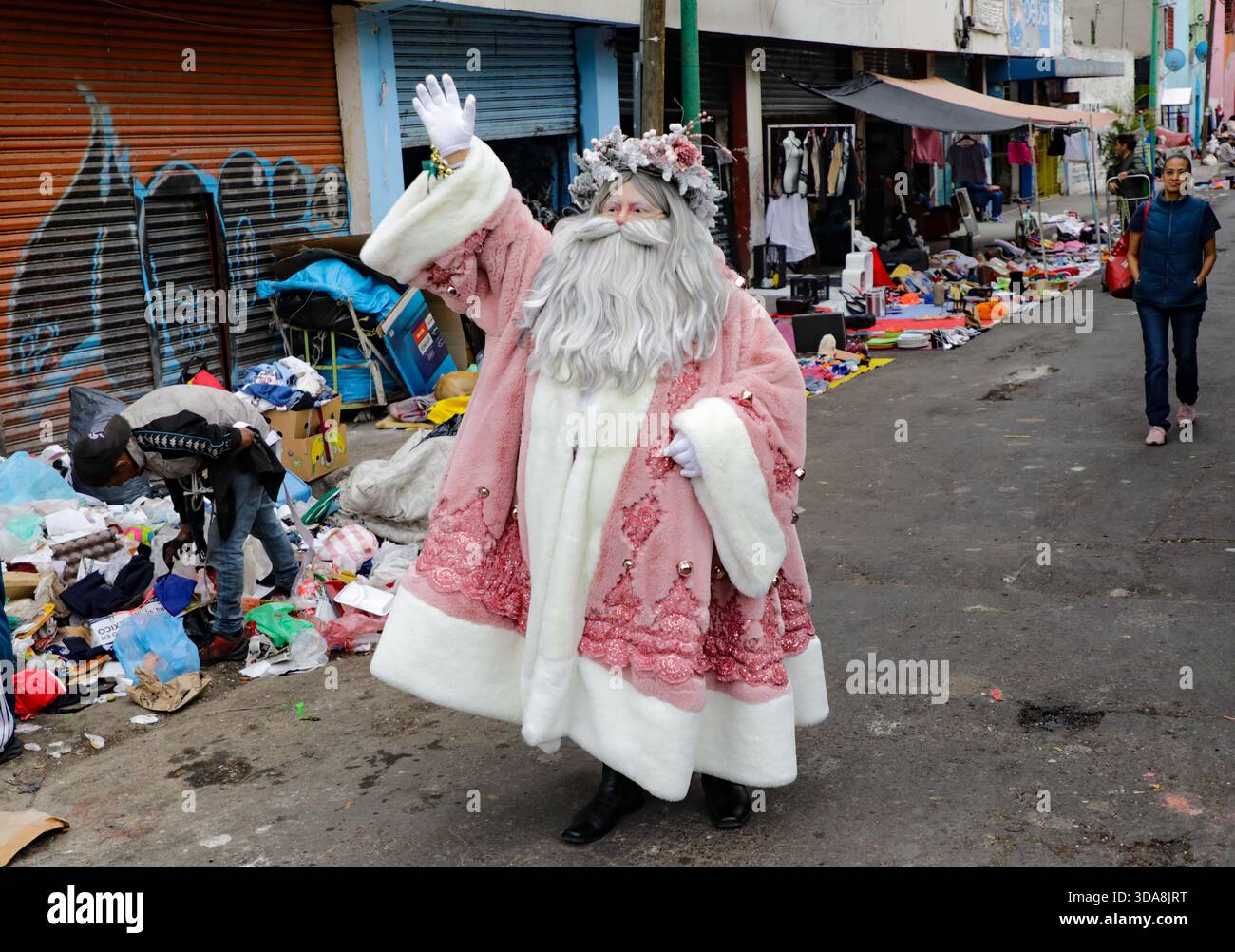 The artist José Miguel Moctezuma, known as Santa Iluminado, making a ...