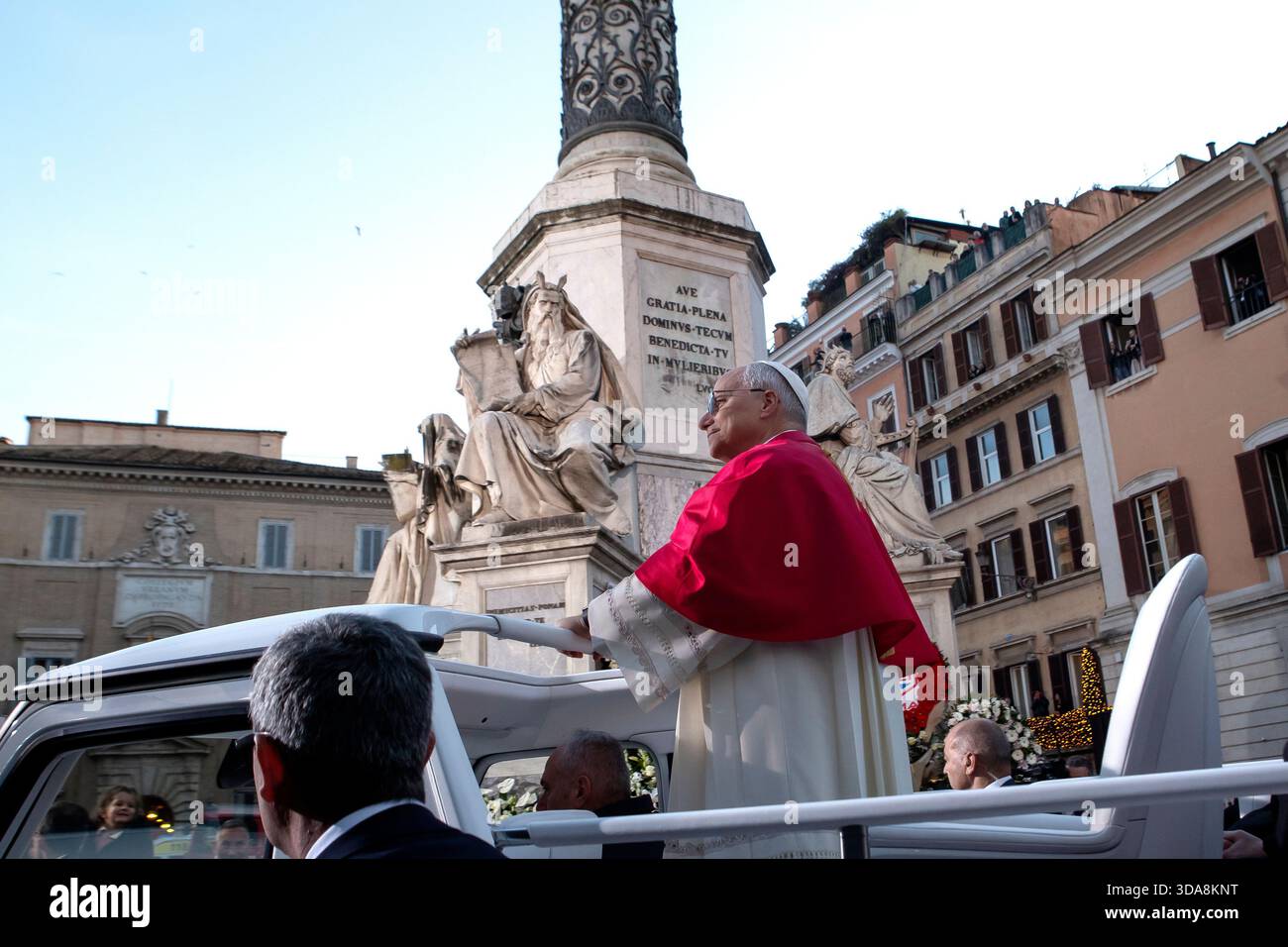 Pope Leo XIV waves as he leaves after paying homage to the statue of ...