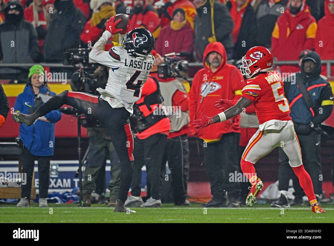Houston Texans cornerback Kamari Lassiter (4) intercepts a pass ...