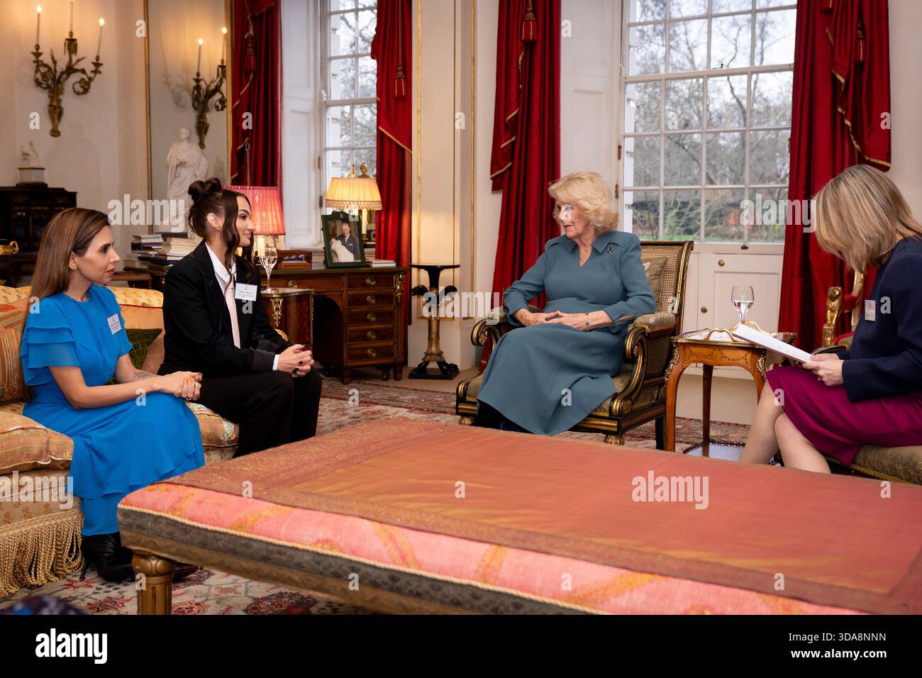 Queen Camilla during a private discussion with Dr Bijna Kotak Dasani ...
