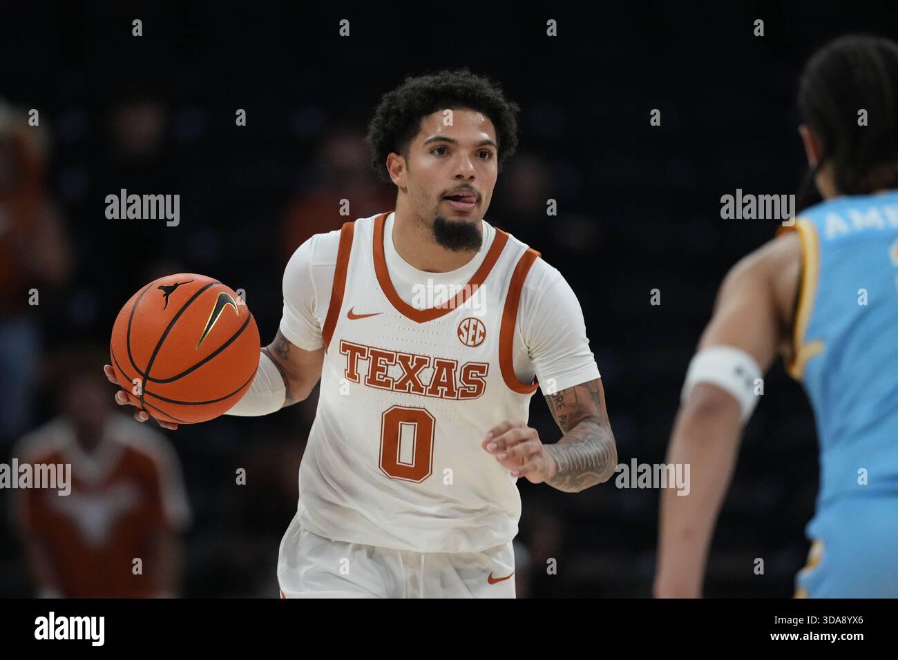 Texas guard Jordan Pope (0) during an NCAA college basketball game ...