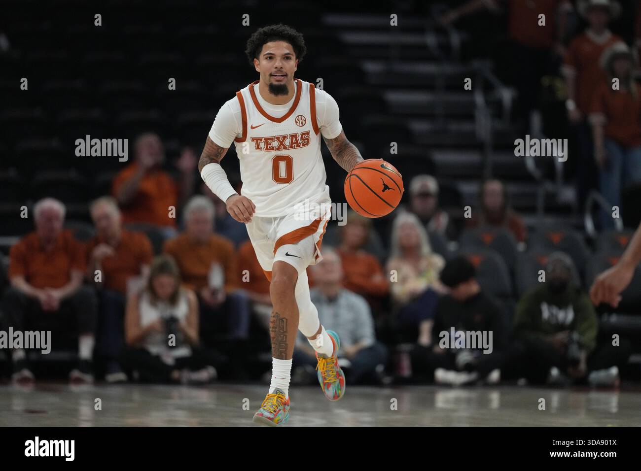 Texas guard Jordan Pope (0) during an NCAA college basketball game ...