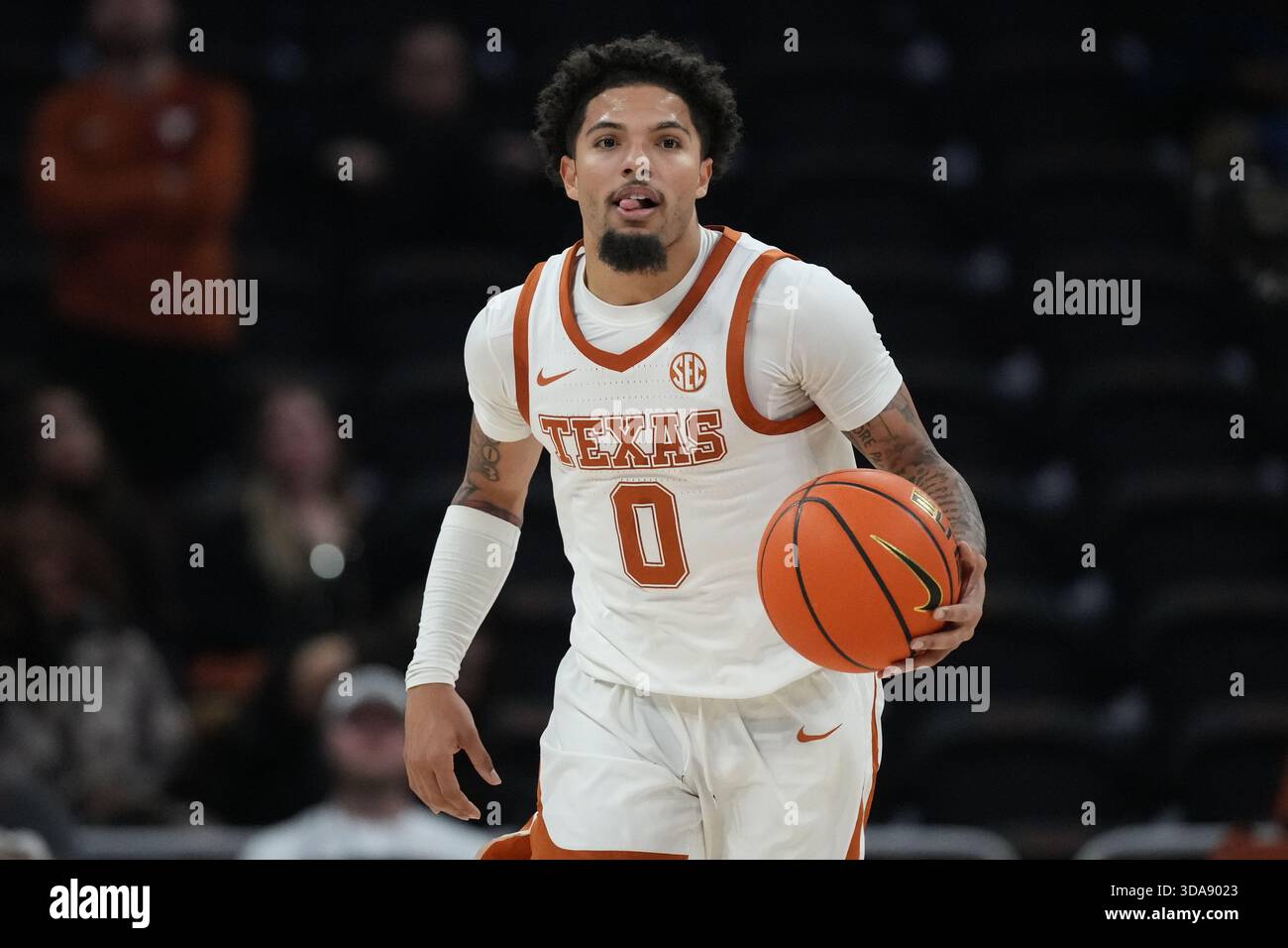 Texas guard Jordan Pope (0) during an NCAA college basketball game ...