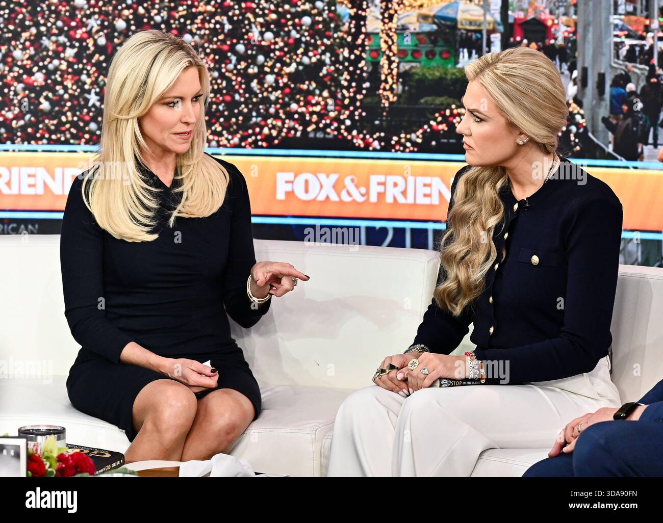 Co-host Ainsley Earhardt, left, chats with Turning Point USA CEO Erika ...