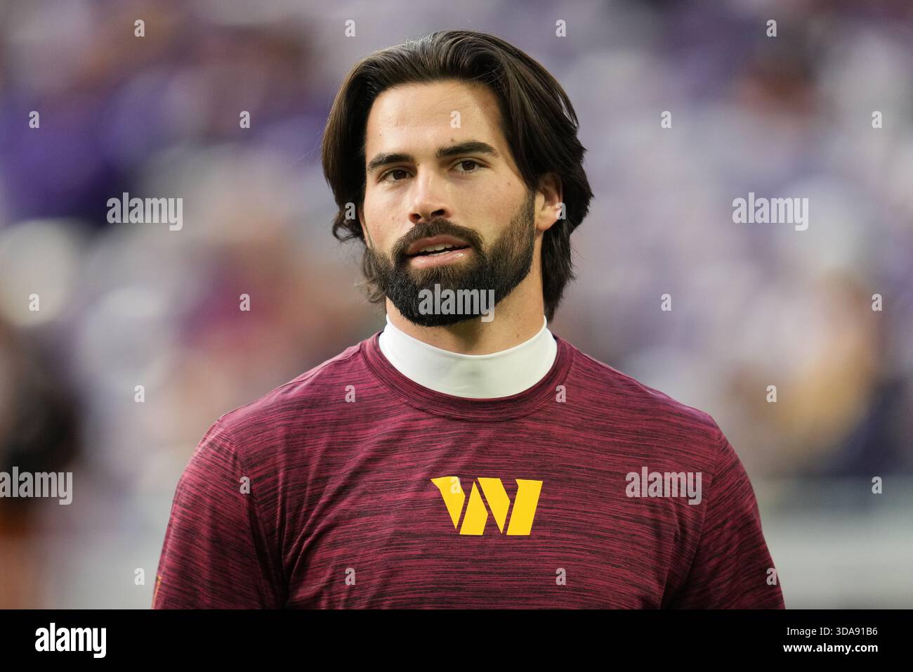Washington Commanders quarterback Sam Hartman (15) stands on the field ...
