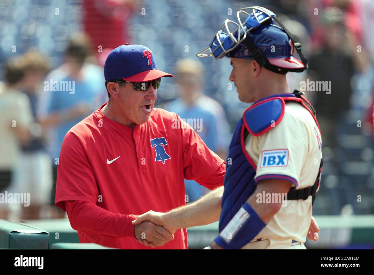 FILE - Philadelphia Phillies manager Rob Thomson celebrates a win ...