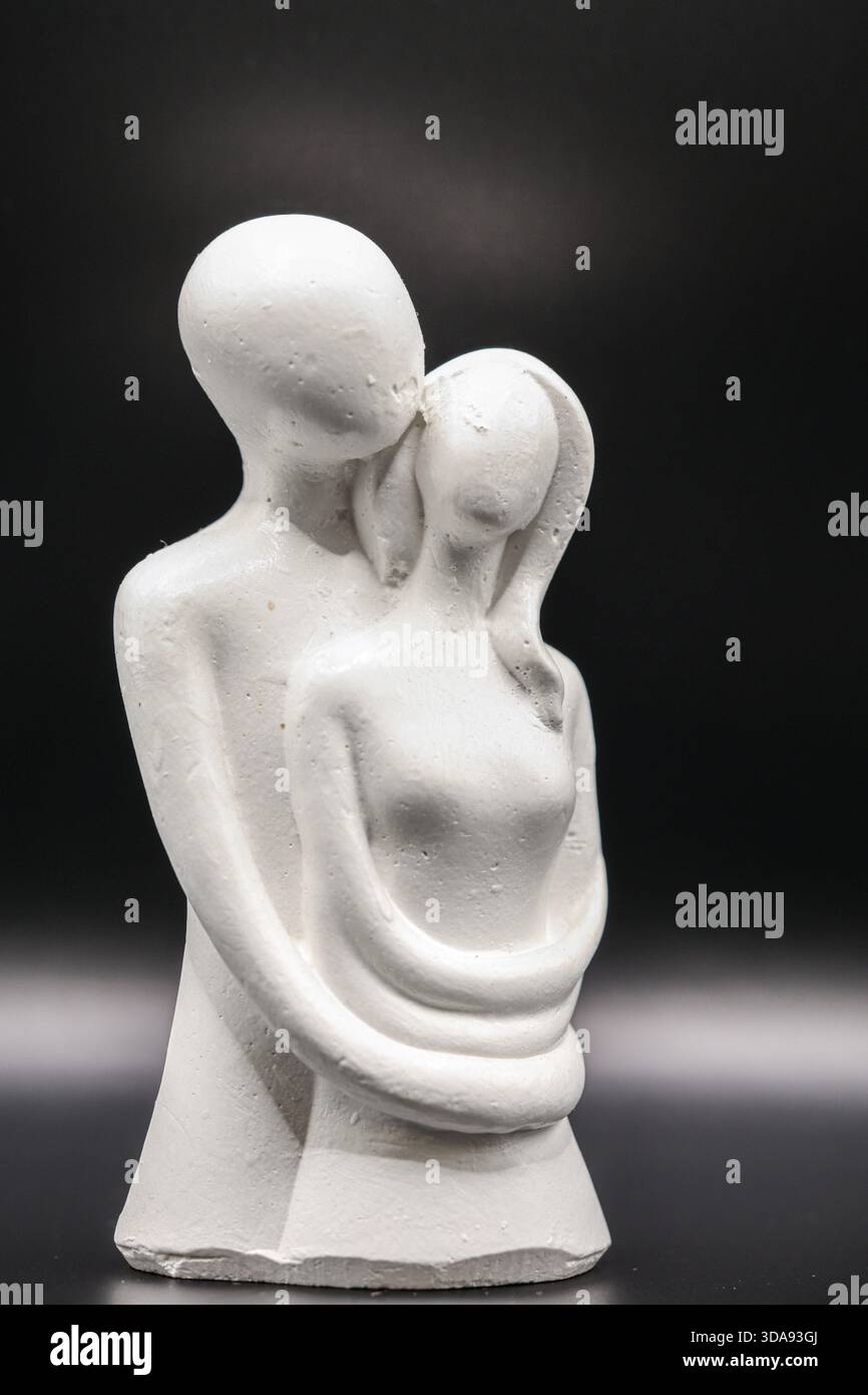 Abstract representation of two figures embracing hi-res stock ...