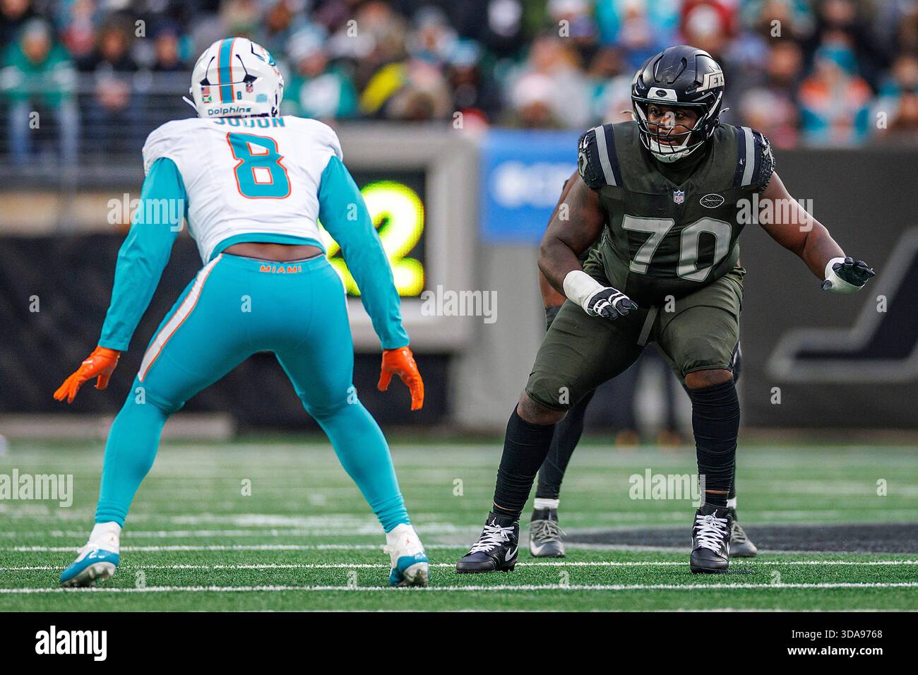 New York Jets offensive tackle Armand Membou (70) lines up to block ...