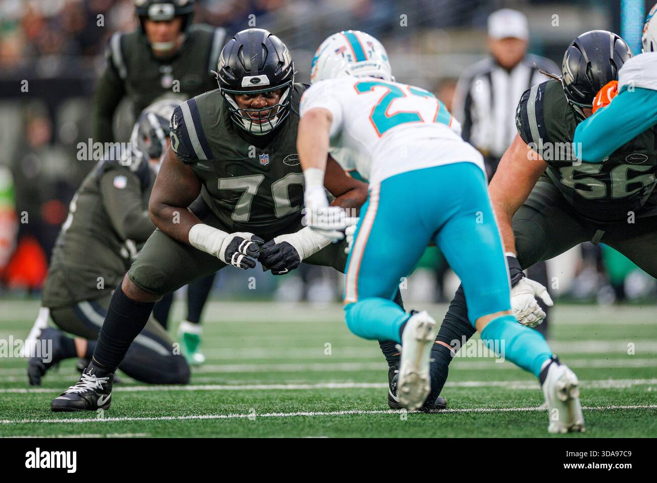 New York Jets offensive tackle Armand Membou (70) prepares to block ...