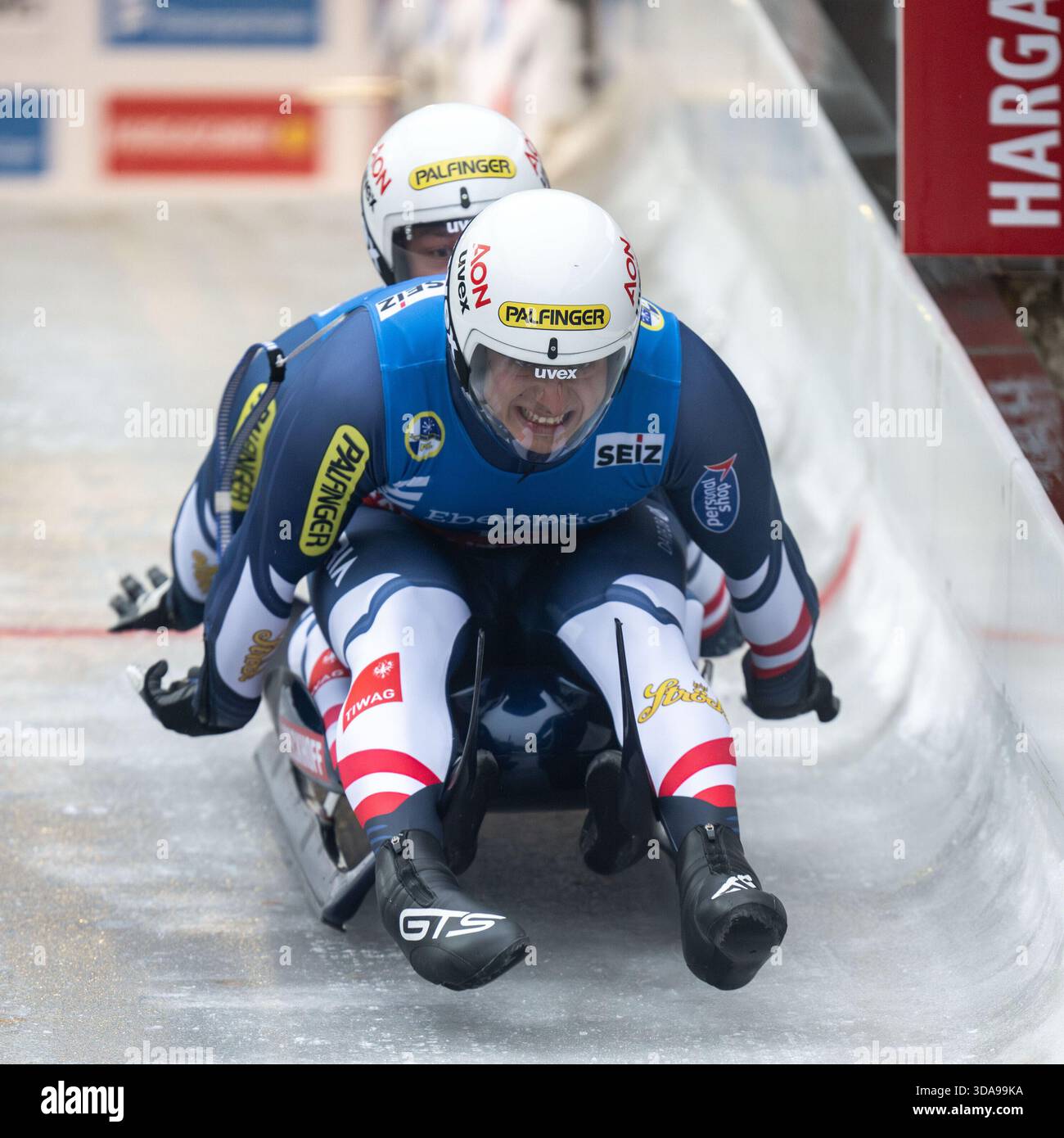 WINTERBERG, GERMANY - DECEMBER 06: Mueller, Yannick (pilot) and Frauscher, Armin (AUT), coming ...
