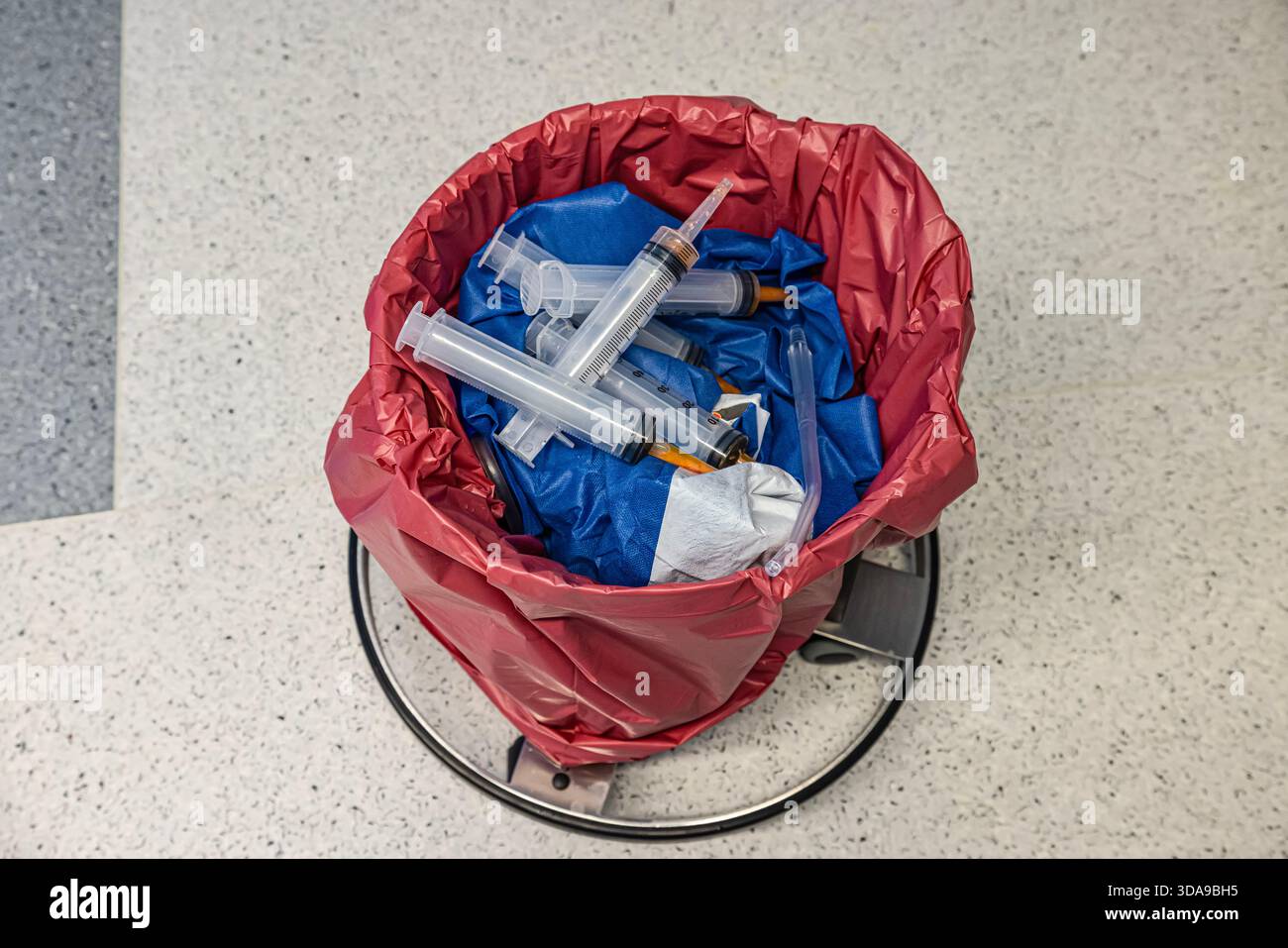 Used Gauze Pads and Syringes Inside a Medical Waste Bin in an Operating ...