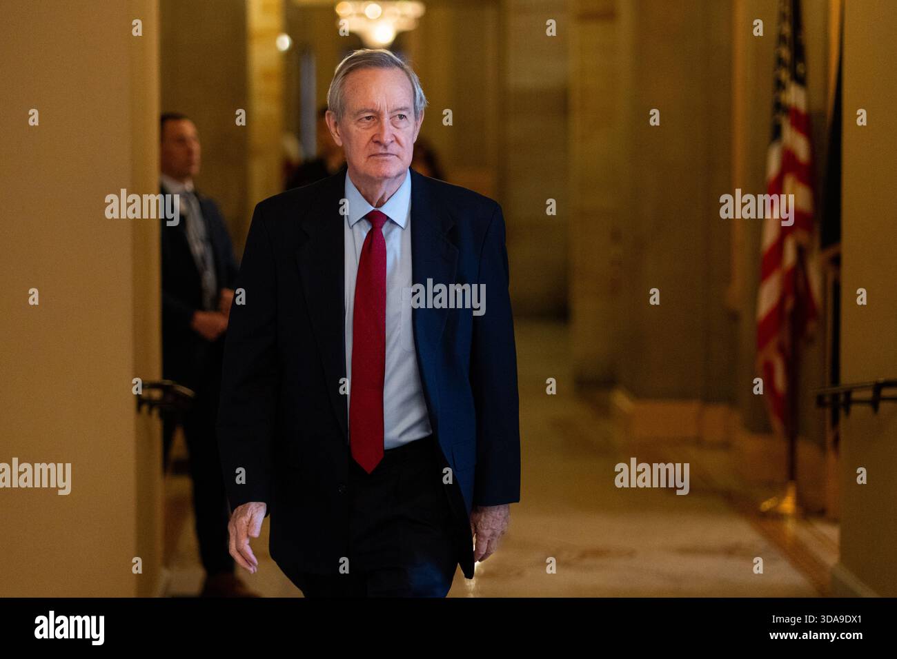 UNITED STATES - DECEMBER 9: Sen. Mike Crapo, R-Idaho, walks to the ...