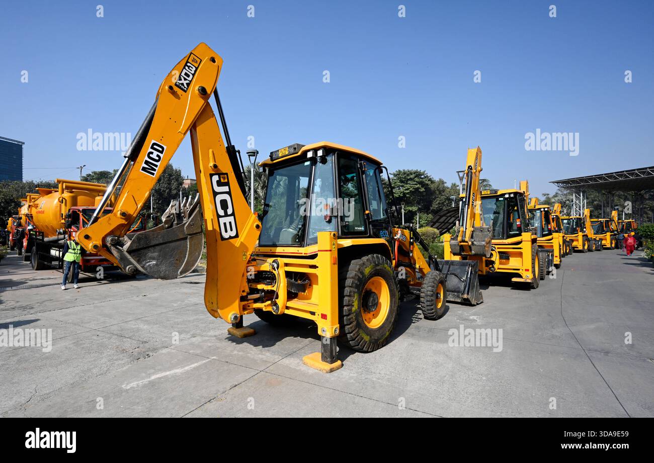 NEW DELHI, INDIA - DECEMBER 9: Fleet of Super Sucker Machines and JCB ...