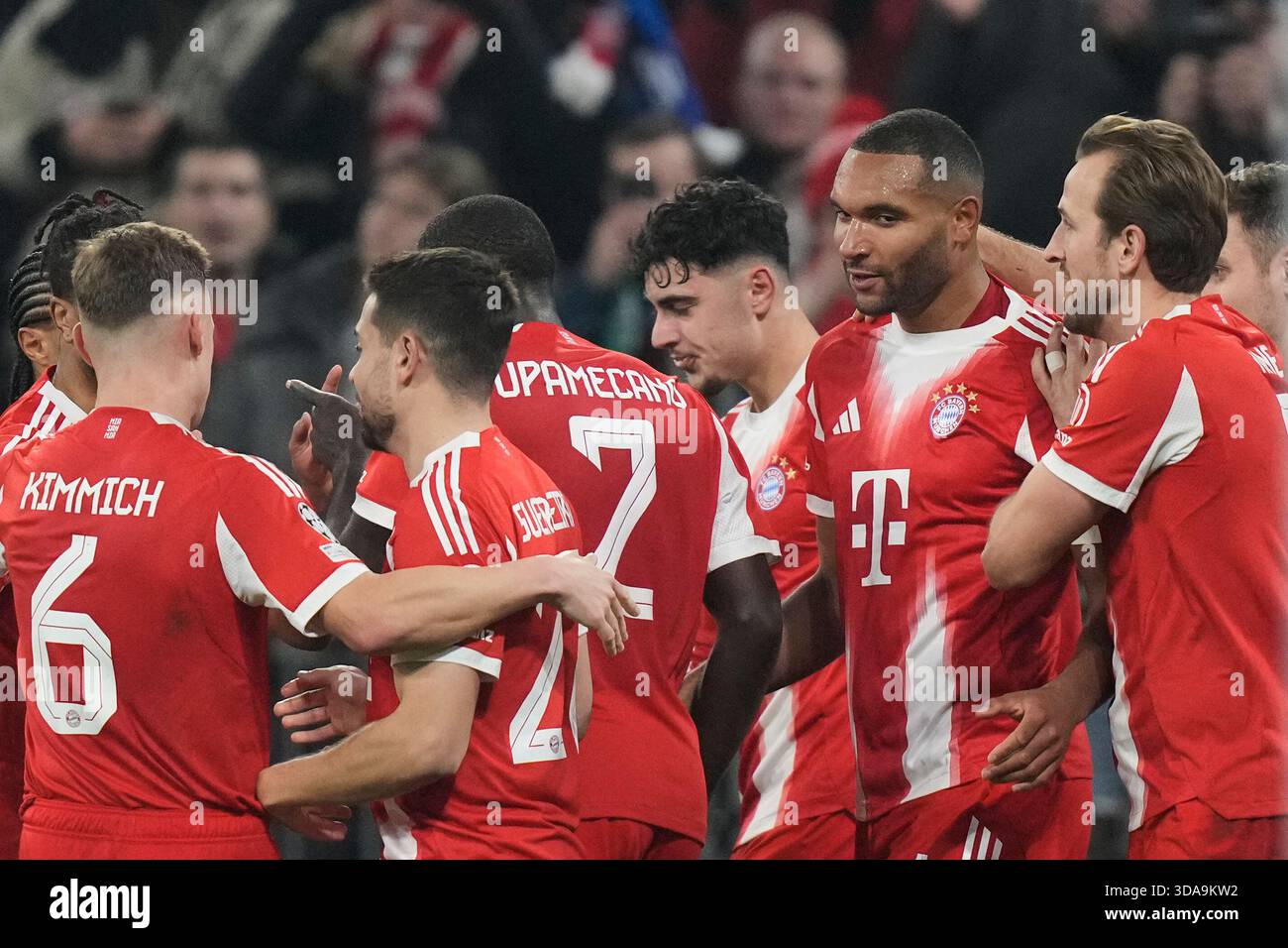 Bayern Munich players celebrate after Bayern's Jonathan Tah, second ...