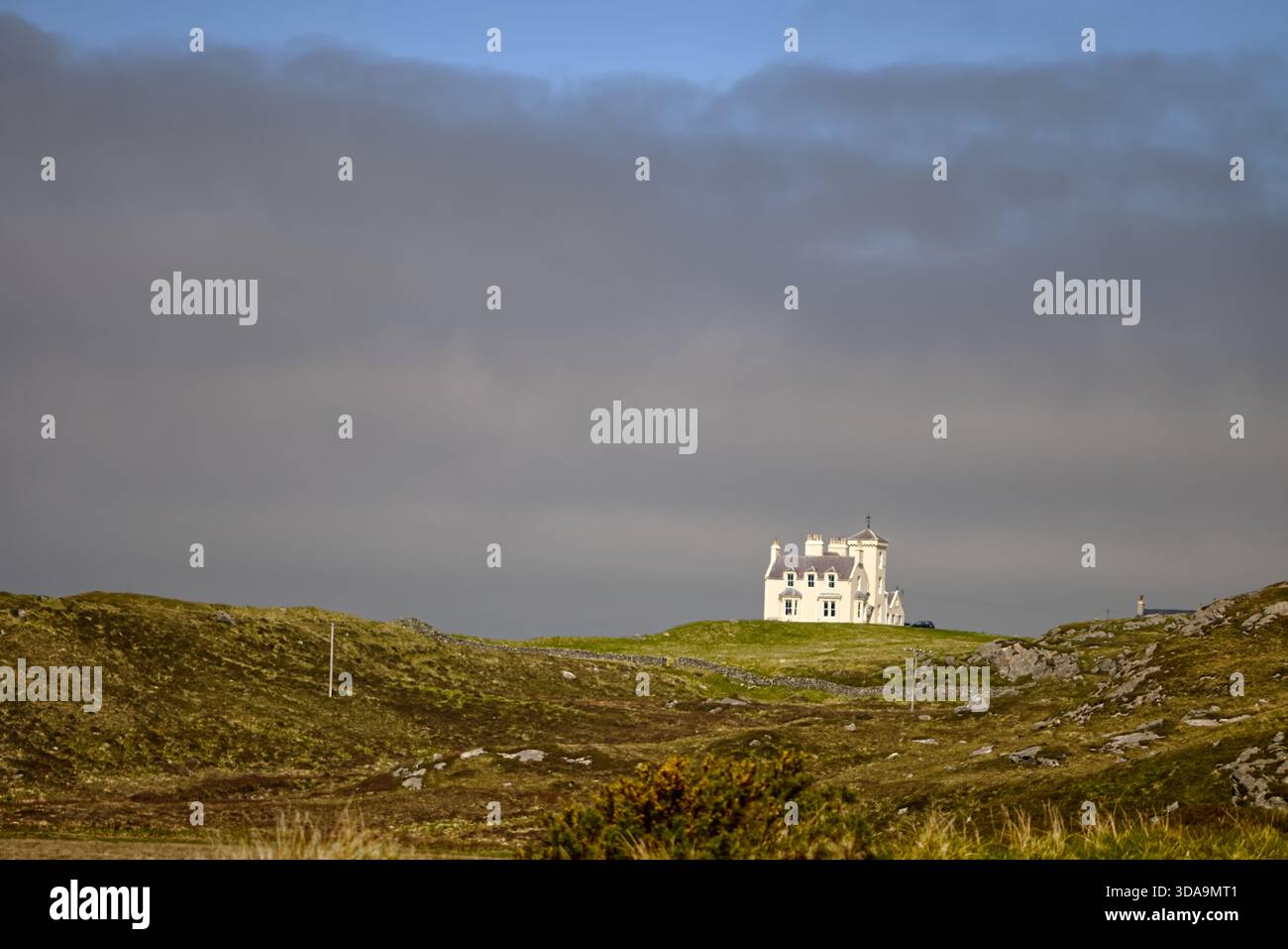 Scottish manor house in front of dark brooding sky hi-res stock ...