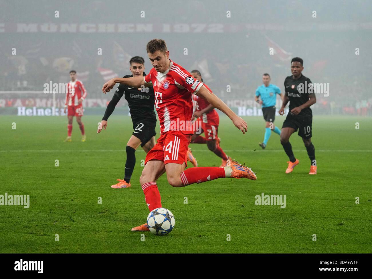 December 09 2025: Josip Stanisic of Bayern Munich controls the ball ...
