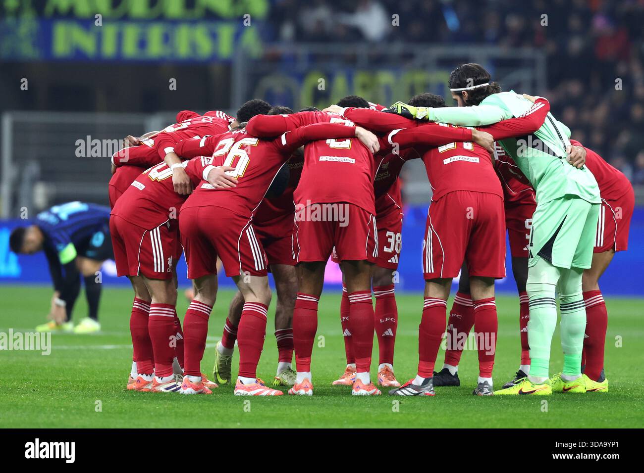 Liverpool players form a huddle before the UEFA Champions League match ...