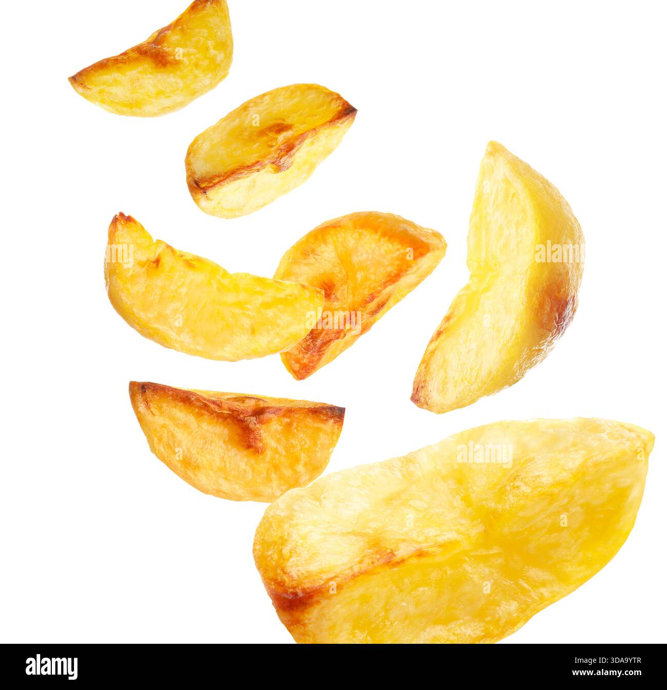 Baked potato wedges falling hi-res stock photography and images - Alamy