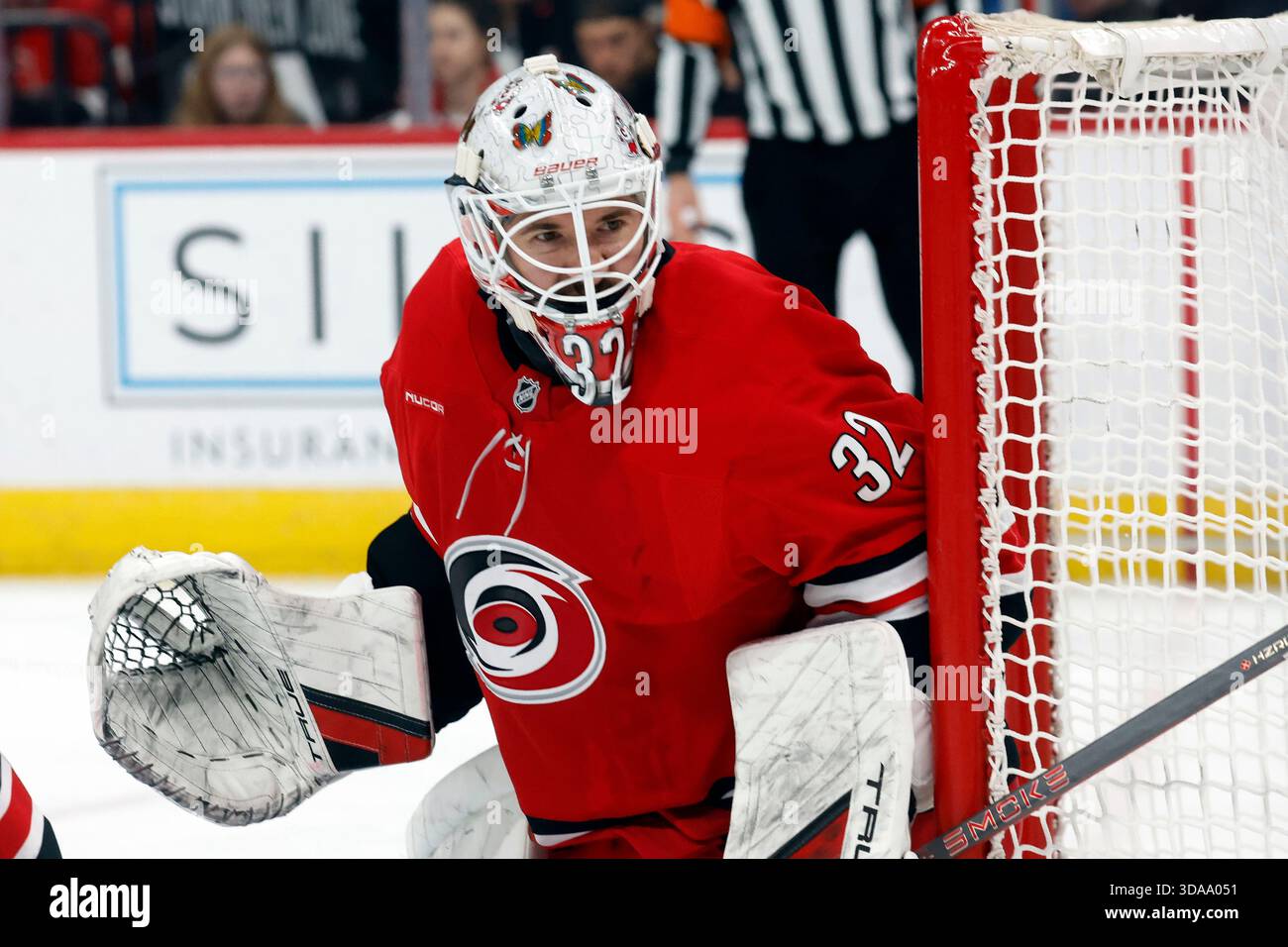 Carolina Hurricanes goaltender Brandon Bussi (32) watches the puck ...