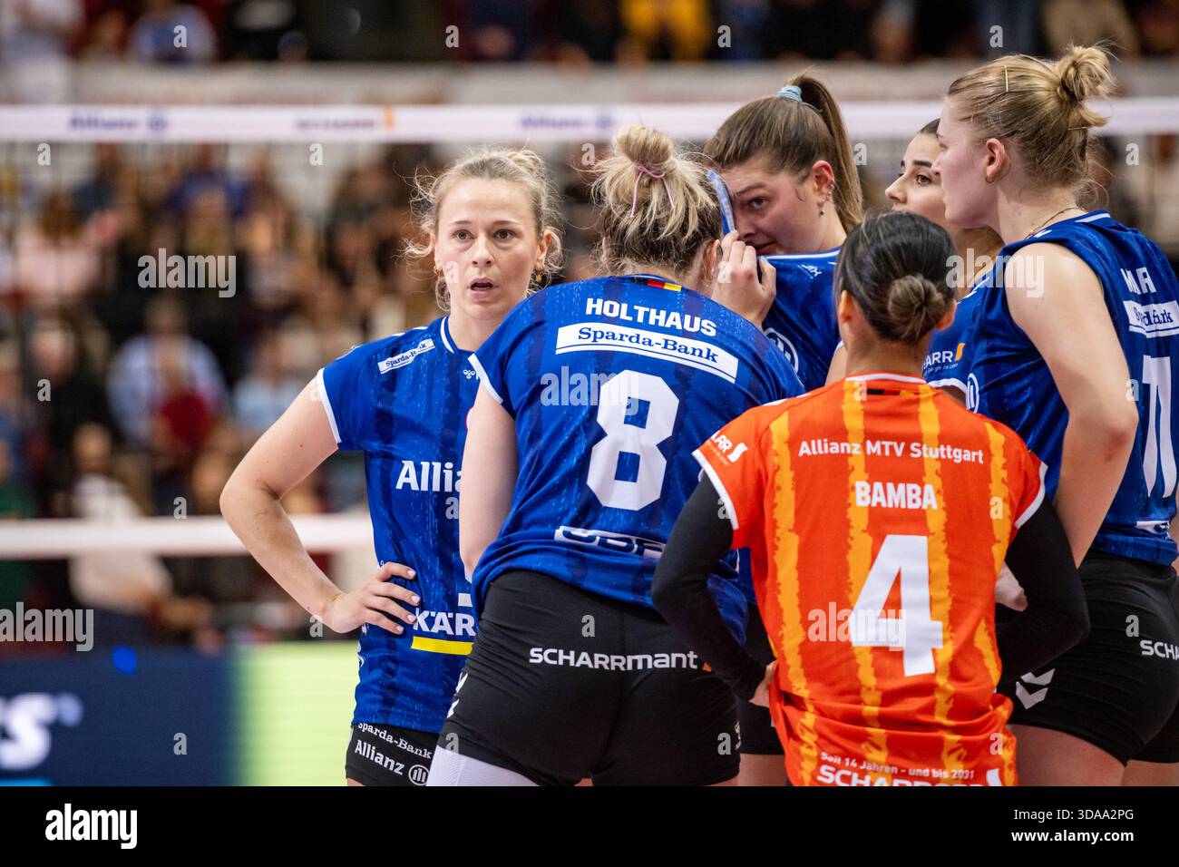Antonia Stautz (Allianz MTV Stuttgart, #06) next to team, contemplative ...