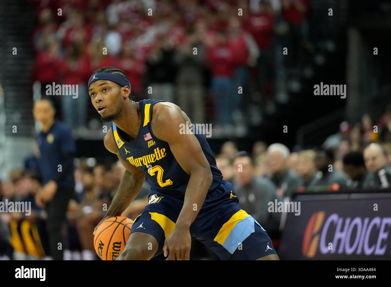 Marquette guard Chase Ross dribbles the ball during the first half of ...