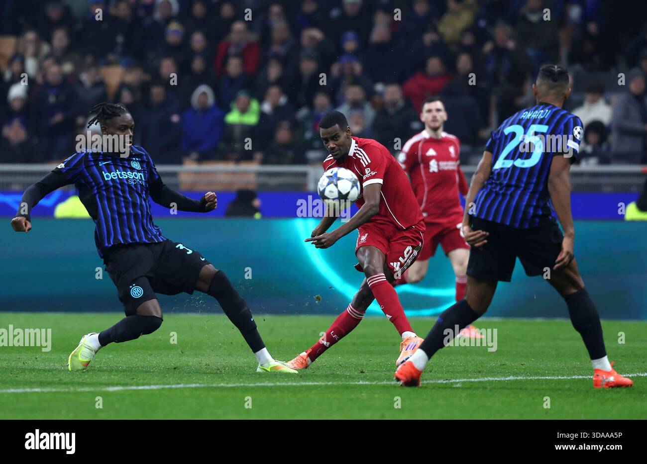 Liverpool's Alexander Isak (centre) attempts a shot towards goal during ...