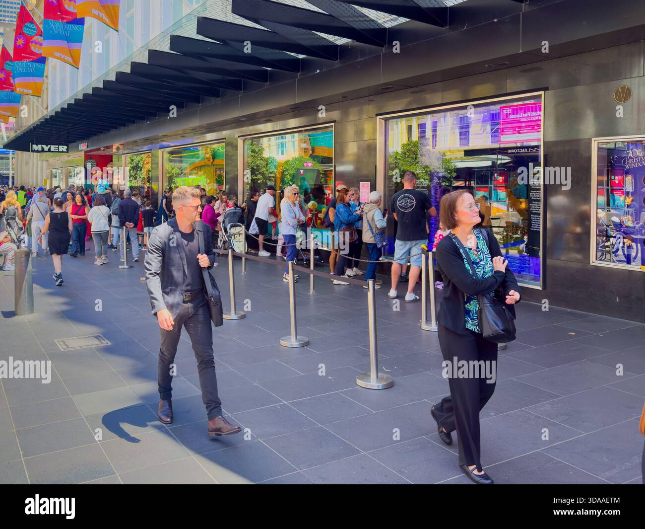 Melbourne, VIC, Australia. December 09, 2025. - A crowd of people walk ...