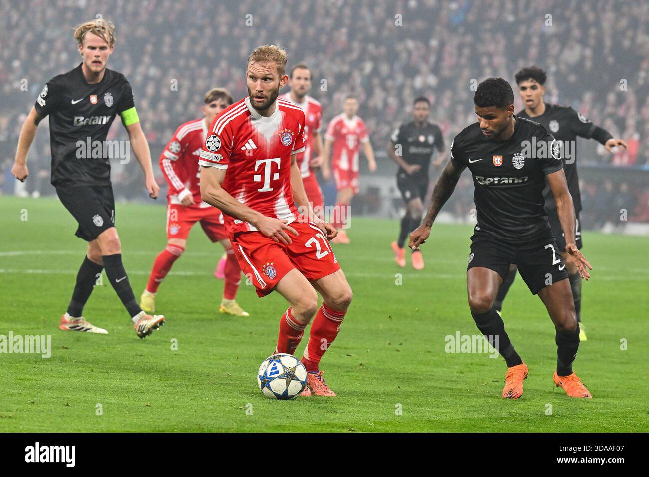 MUNICH, GERMANY - December 09: in the duel Konrad LAIMER (FC Bayern ...