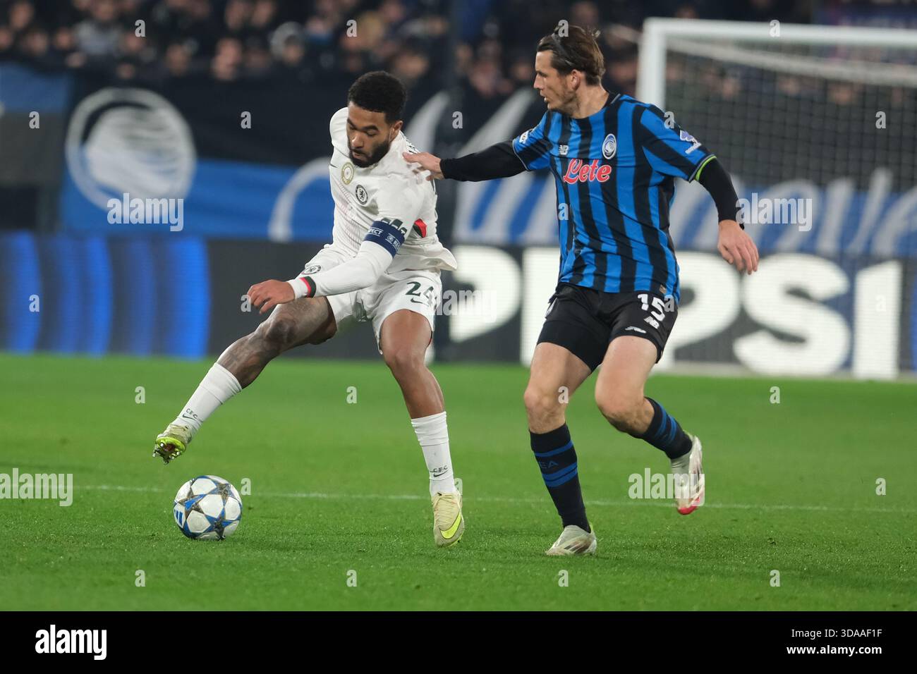 Reece James of Chelsea Football Club contrasted by Martin de Roon of ...
