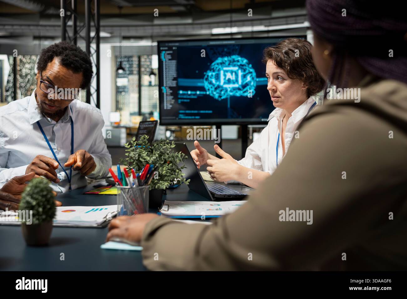 AI unicorn startup staff members discussing tech roadmap during ...