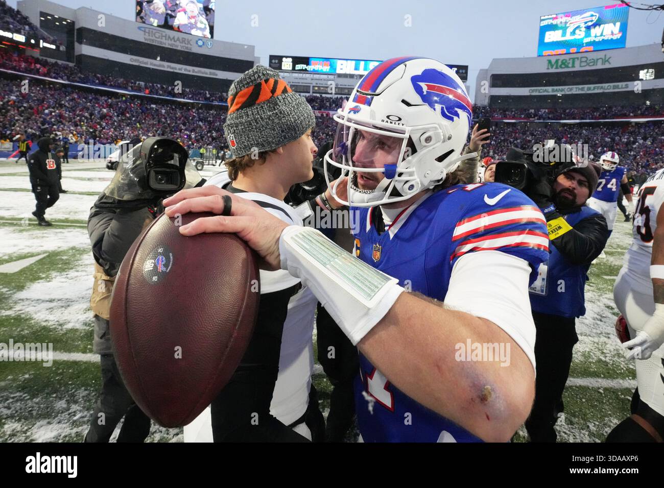 Buffalo Bills quarterback Josh Allen, right, meets Cincinnati Bengals ...