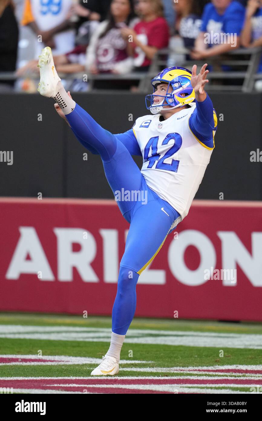 Los Angeles Rams punter Ethan Evans (42) punts the ball against the ...