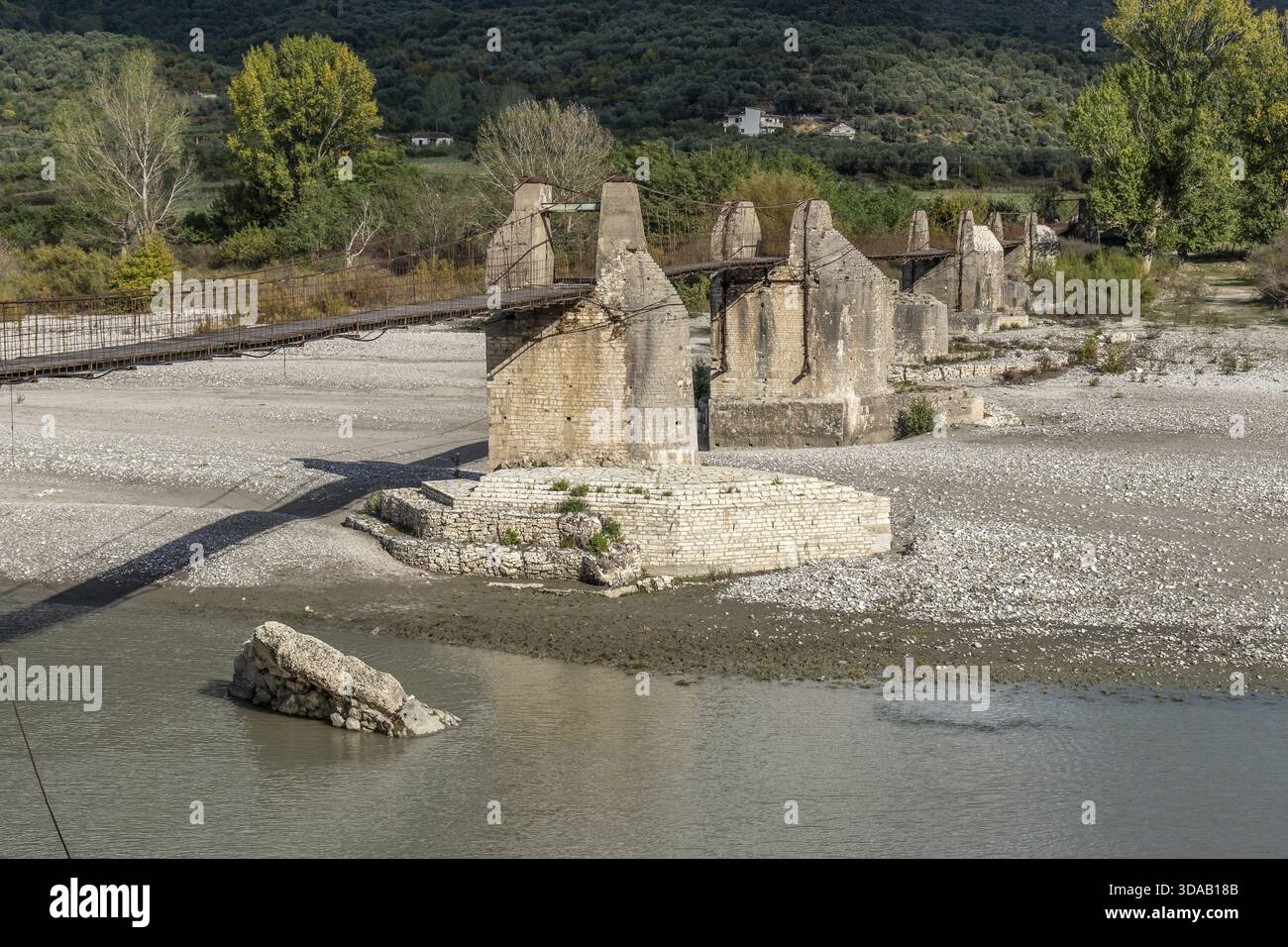 Stone pillars of Ali Pasha Bridge in the dry course of the river ...