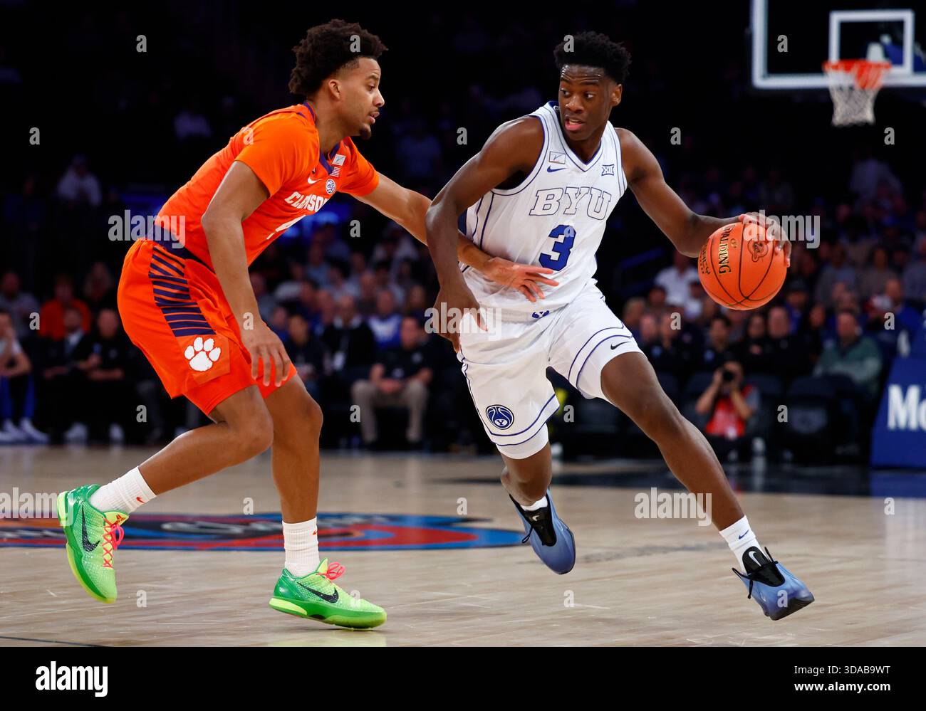 BYU forward AJ Dybantsa (3) drives to the basket against Clemson guard ...