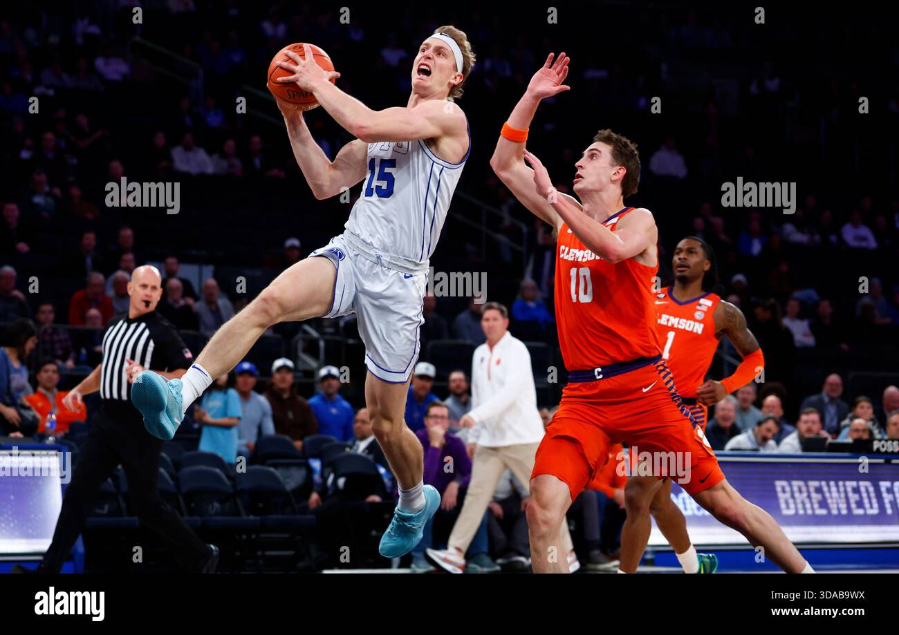 BYU guard Richie Saunders (15) drives to the basket against Clemson ...