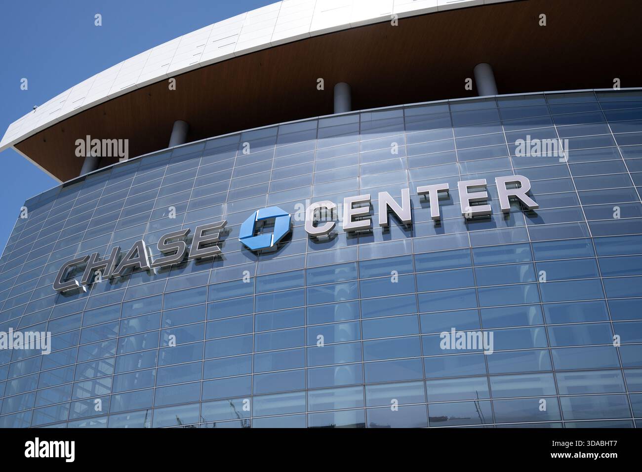 Exterior of Chase Center arena with glass facade and logo on clear day ...