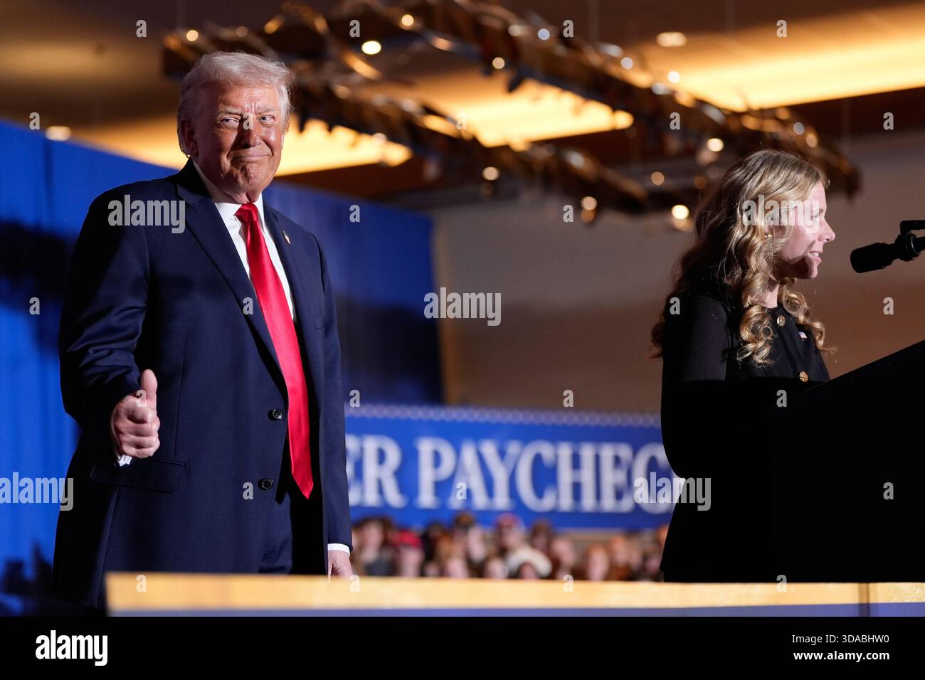 President Donald Trump reacts as Megan Hemhauser speaks at Mount Airy ...