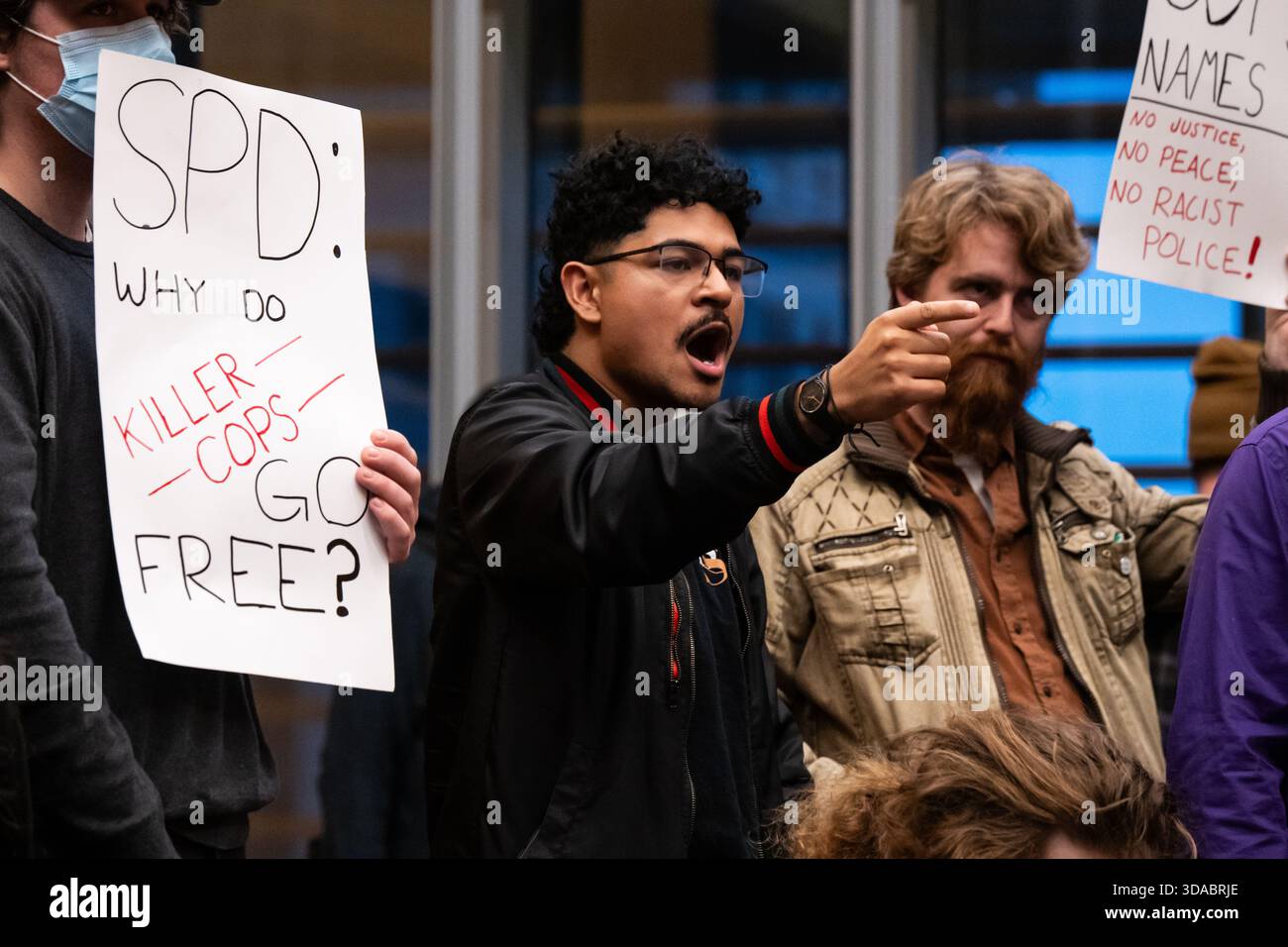 Seattle, USA. 6th Dec 2025. Several dozen protestors filled Seattle ...