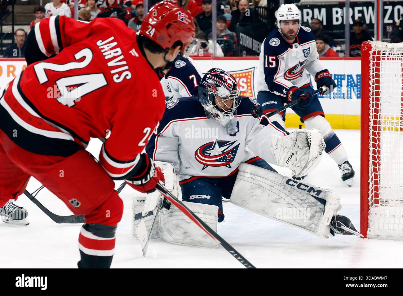 Carolina Hurricanes' Seth Jarvis (24) has his shot blocked by Columbus ...