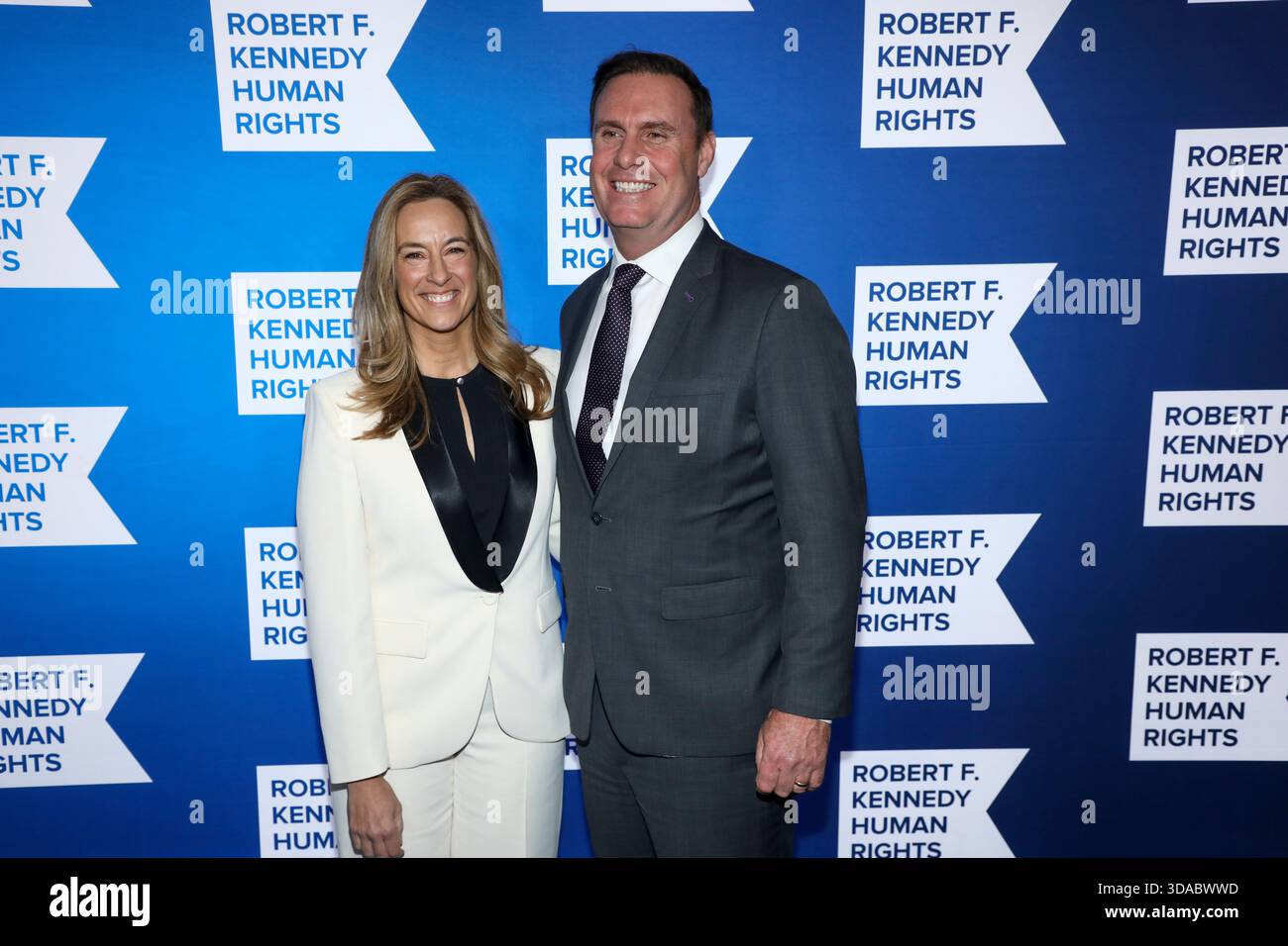 Governor-elect of New Jersey Mikie Sherrill, left, and Jason Hedberg ...