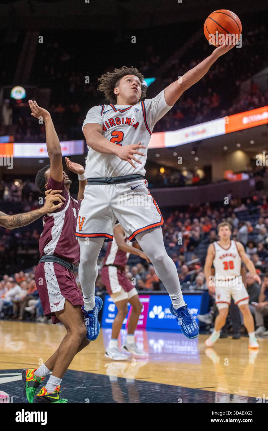 Virginia guard Chance Mallory (2) drives to the basket against Maryland ...