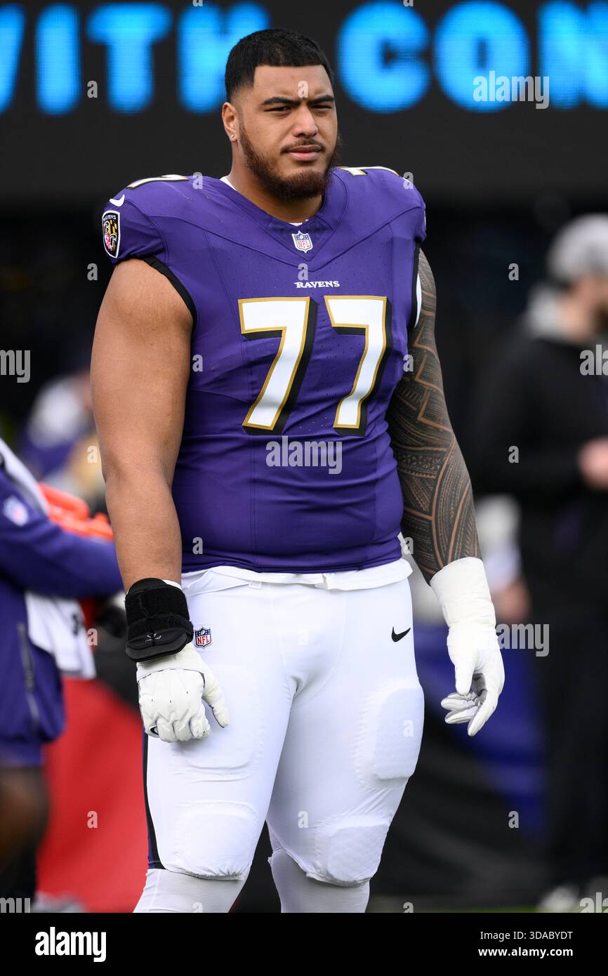 Baltimore Ravens guard Daniel Faalele (77) warms up before an NFL ...